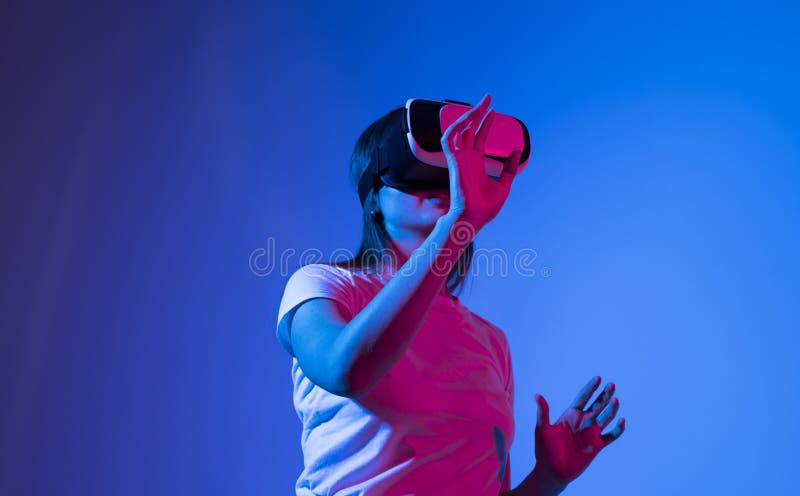 Woman In Vr Headset Looking Up And Trying To Touch Objects In Virtual