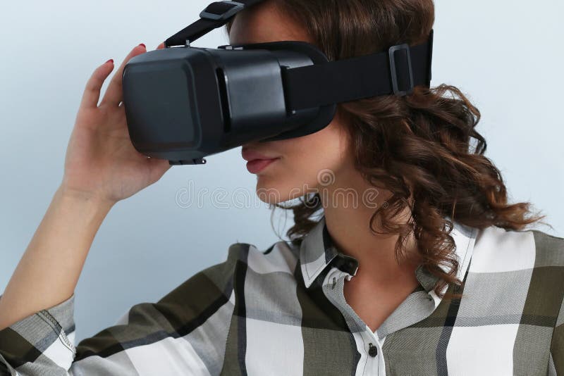 Woman with VR headset stock image. Image of simulation - 79385849