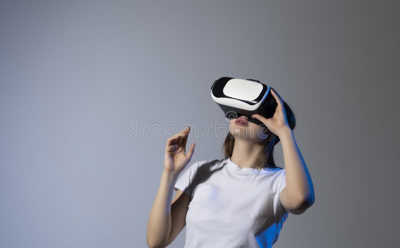 Woman in VR Headset Using Finger To Touch on Imaginary Panel Viewing on ...