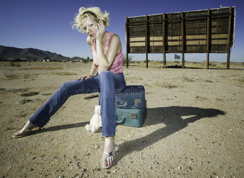 Woman waiting stock photo. Image of suitcase, pink, shirt - 3790266