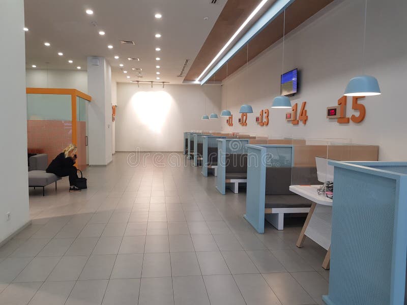 Woman Waiting Alone in Bank Countier Stock Photo - Image of building ...