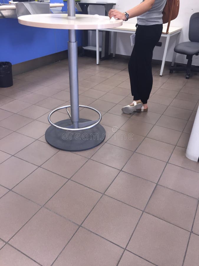 Woman Waiting at Post Office Stock Image - Image of body, table: 57271023