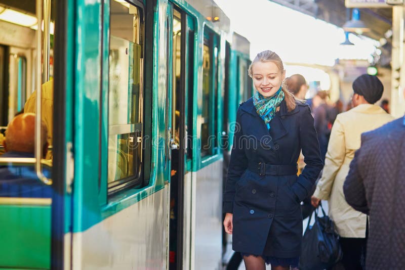 Woman Waiting for a Train on the Platform of Parisian Underground Stock ...