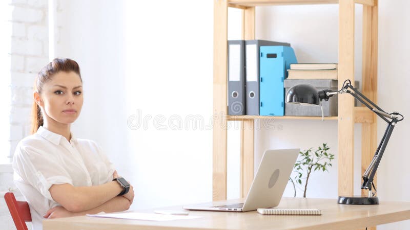 Woman Waiting at Work stock photo. Image of expression - 98567862