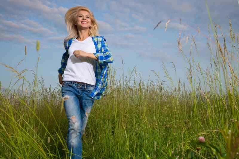 Woman walk in grass field stock photo. Image of leisure - 38699672