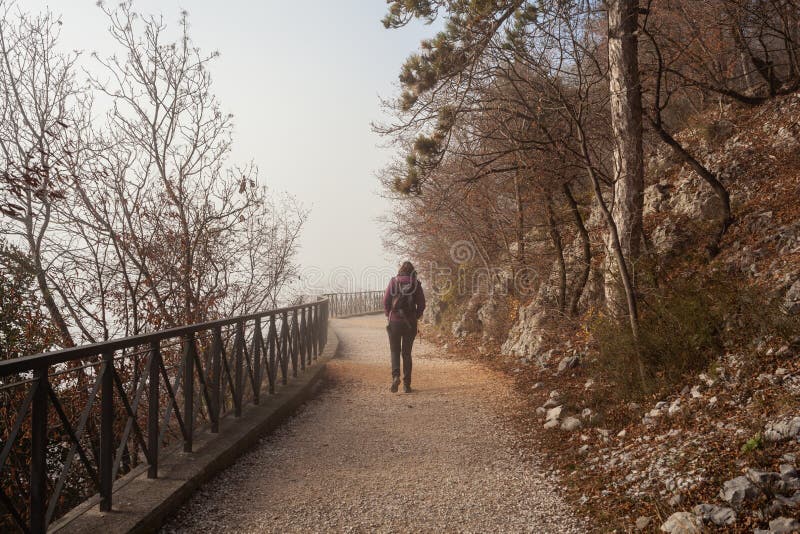 Woman Walking Alone on Rural Misty Path Editorial Photography - Image ...