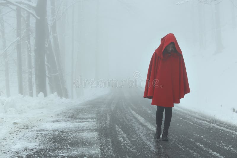 Woman Walking Alone on Snowy Road Stock Image - Image of costume, alone ...