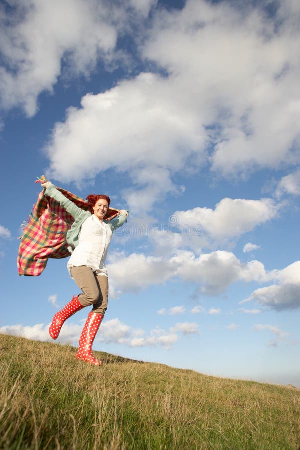 Woman Walking in Countryside Stock Image - Image of camera, fall: 21407403