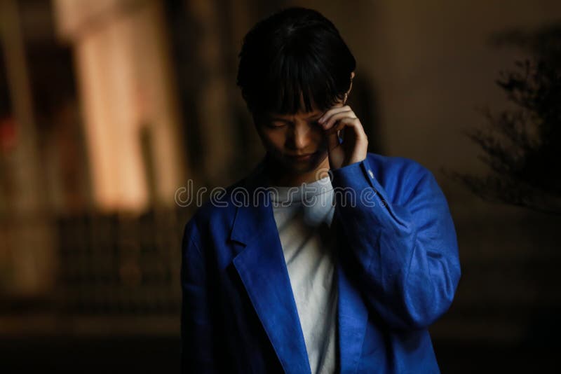 Woman walking while crying stock image. Image of night - 248351069