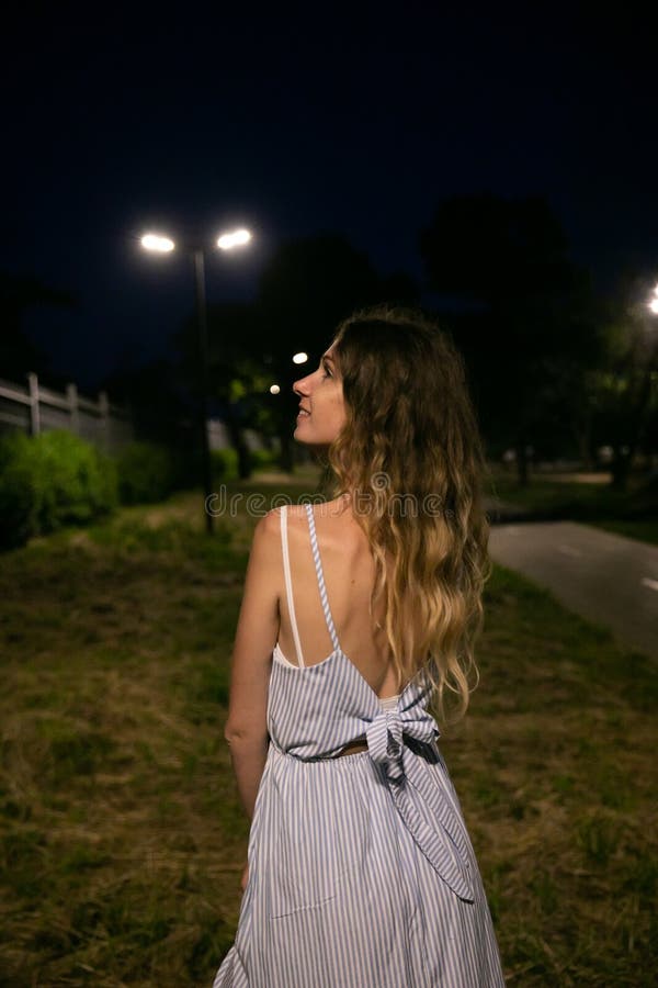 Woman Walking at Night in the Park Stock Photo - Image of city ...