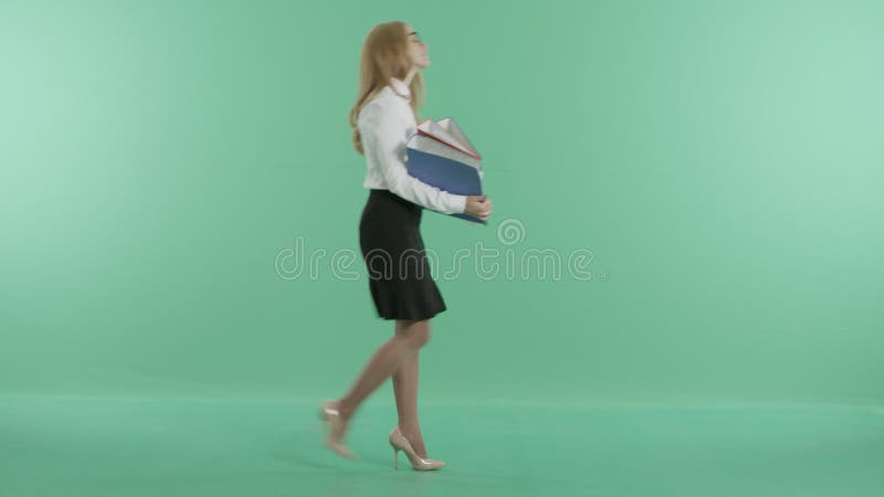 A Woman is Walking with Papers Stock Footage - Video of people, papers ...