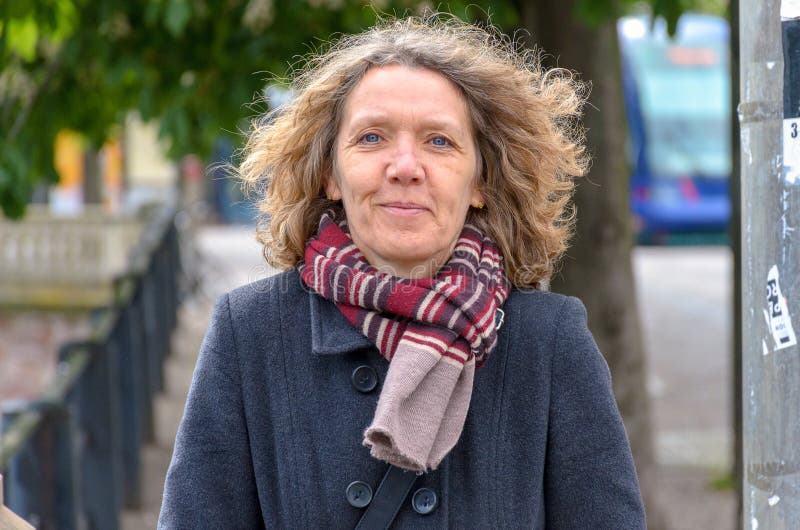 Woman Walking Purposefully through Town Stock Photo - Image of france ...