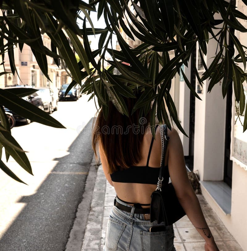 Woman Walking on the Side Walk Stock Photo - Image of face, walking ...