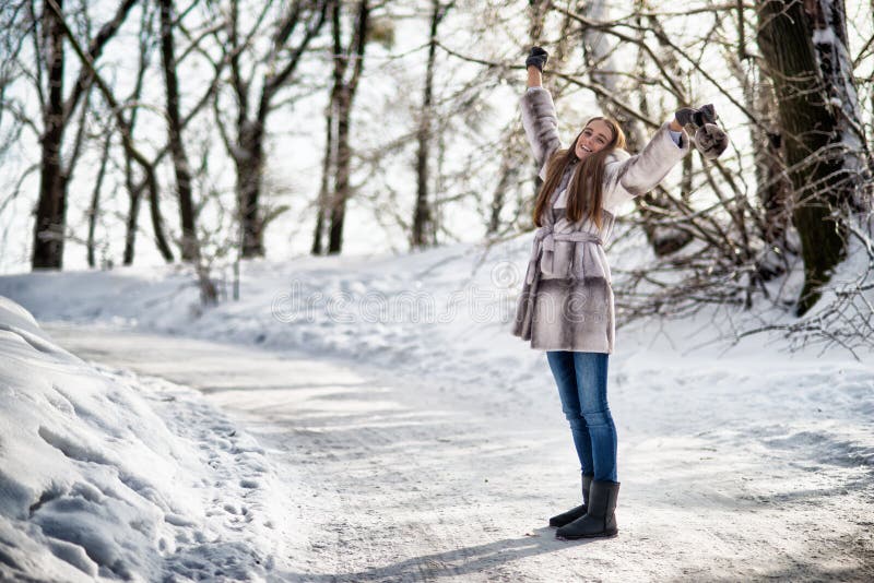Woman Walking in Winter Forest and Have Fun Stock Photo - Image of ...