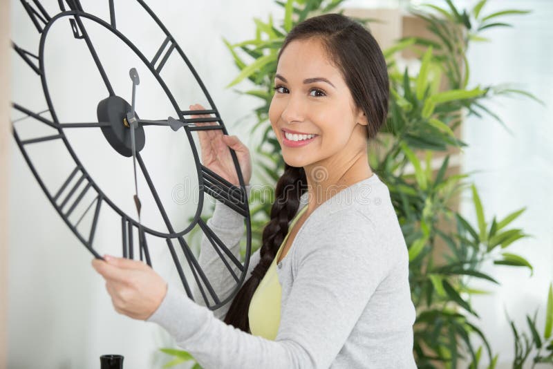 Woman with Wall Clock in Hand Stock Photo - Image of women, woman ...