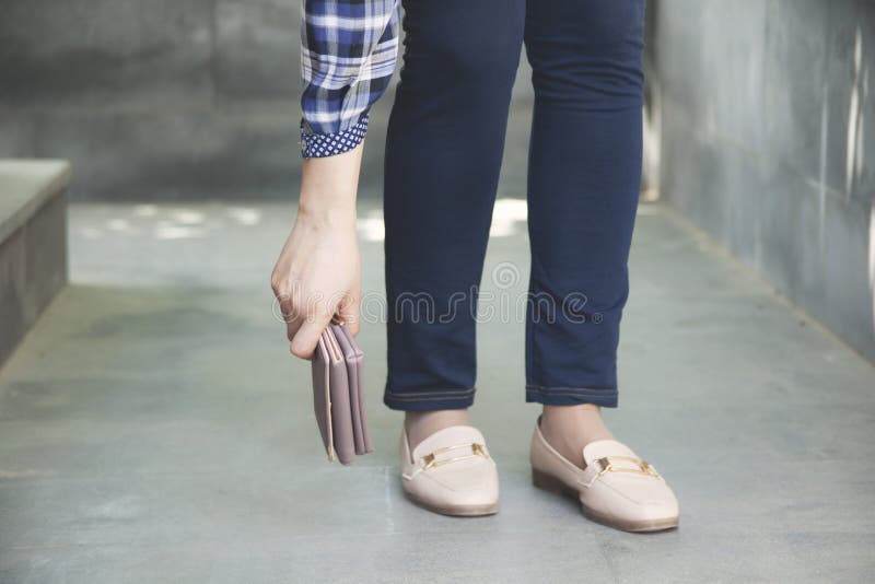 Woman and a Wallet on the Ground in Street. Stock Image - Image of ...