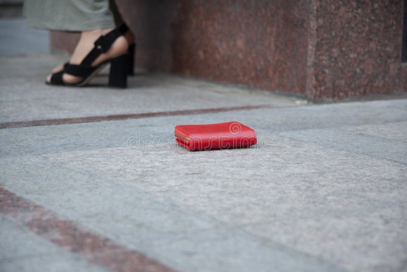 Woman and a Wallet on the Ground Stock Image - Image of male, pick ...