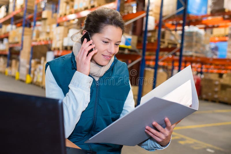 Woman Warehouse Worker or Supervisor with Smartphone Stock Photo ...