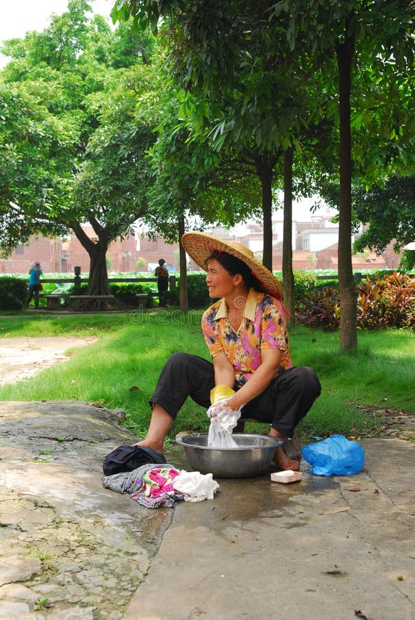 Woman washing cloth editorial image. Image of clothes - 20263085