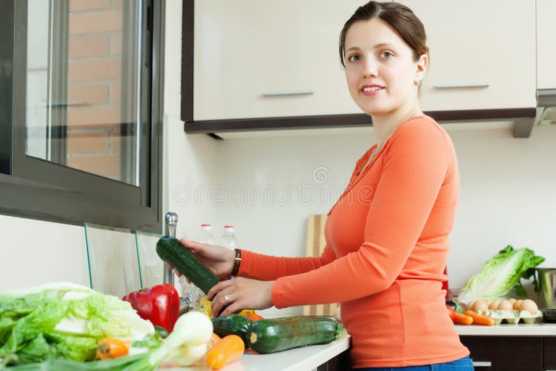 Woman Washing Fresh Squash in Sink Stock Photo - Image of smile, cook ...
