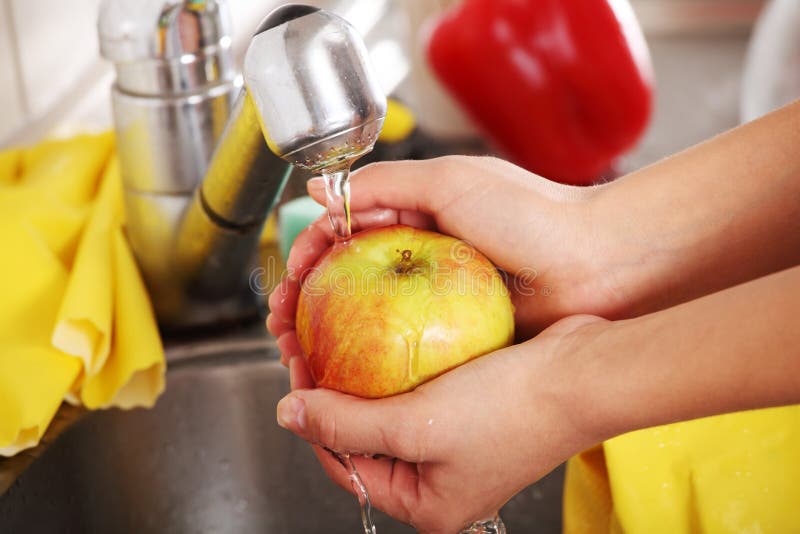 Woman washing fruits stock image. Image of flowing, healthy - 19761117