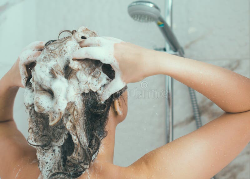 Woman washing her head. stock image. Image of back, bath - 82540615