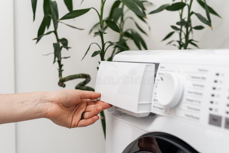Woman Washing Laundry Using Modern Automatic Machine Stock Photo ...