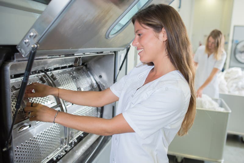 Woman and washing machine stock photo. Image of machine - 123020672