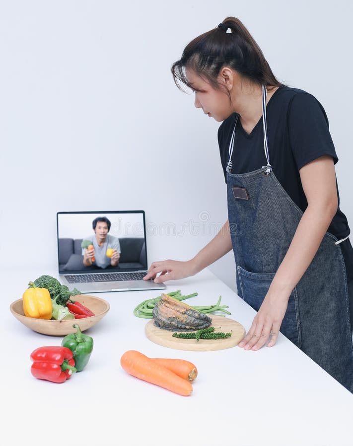 Woman Watching and Learn Online Cooking Courses in the Kitchen ...