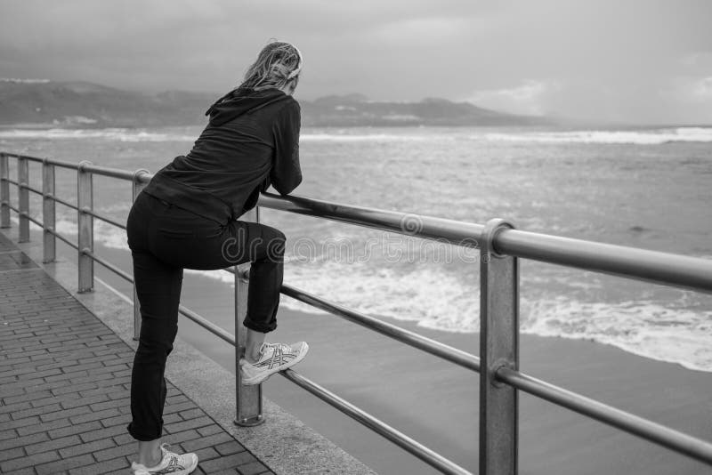 Woman watching the ocean editorial image. Image of canaria - 97228080