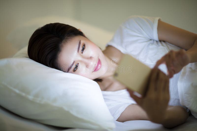 Woman Watching Smart Phone in Bed at Night Stock Image - Image of happy ...