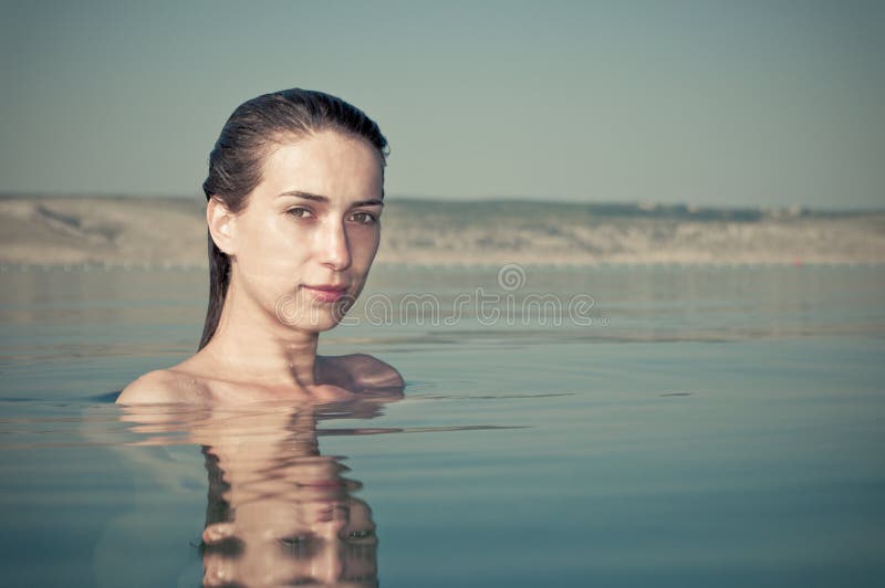 Woman in the water stock photo. Image of beauty, beach - 20643264