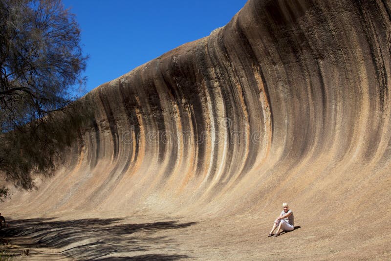 Woman at Wave Rock stock photo. Image of western, geology - 22269276