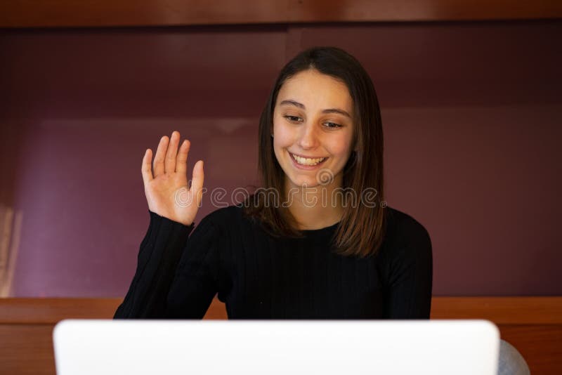 Woman Waving in a Video Call with the Computer Stock Photo - Image of ...