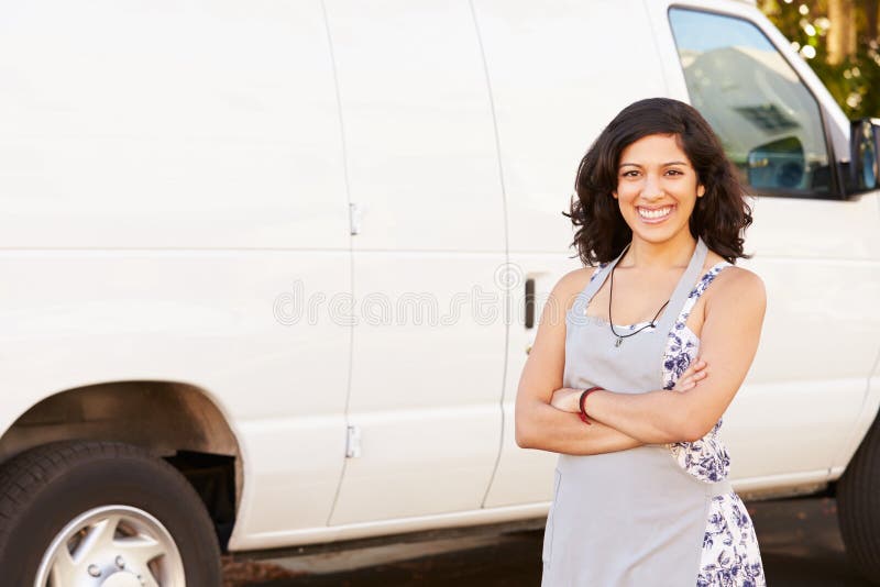 Woman Wearing Apron Standing in Front of Van Stock Photo - Image of ...