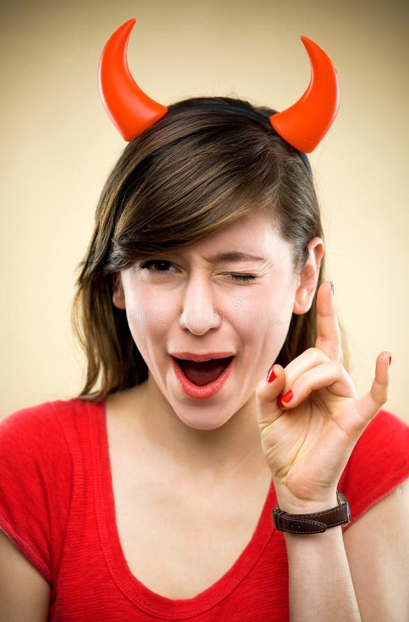 Woman wearing devil horns stock photo. Image of halloween - 23152610