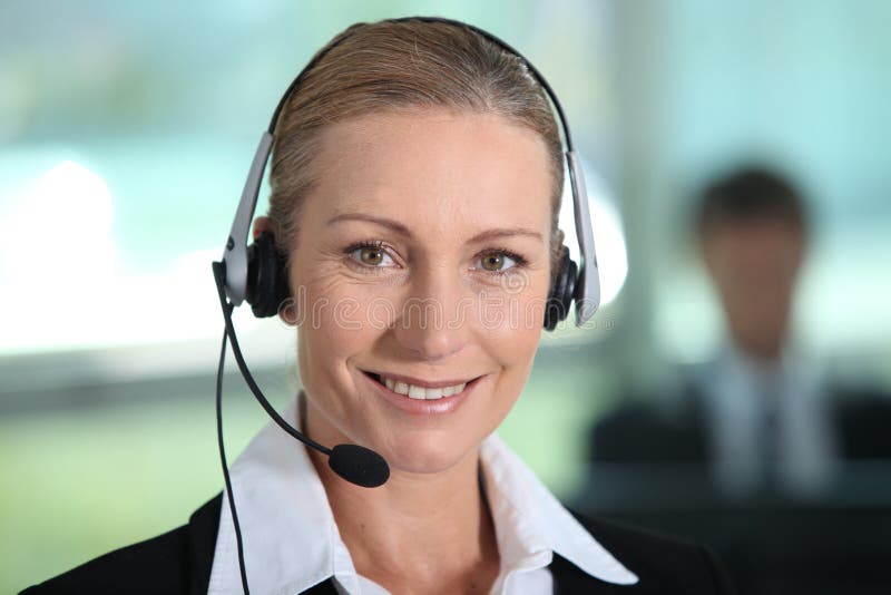 Woman wearing a headset stock image. Image of indoors - 29066033