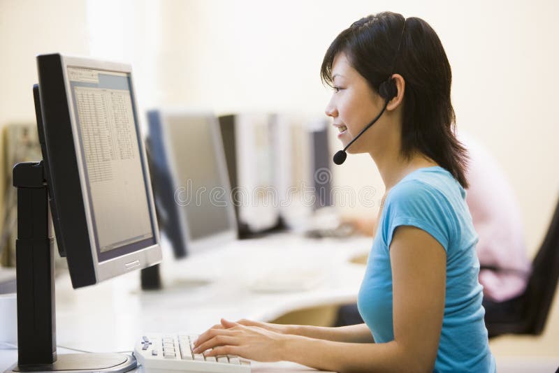 Woman Wearing Headset in Computer Room Stock Photo - Image of desktop ...