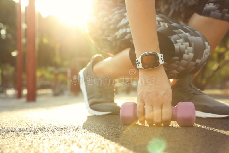 Woman Wearing Modern Smart Watch during Training Outdoors, Closeup ...