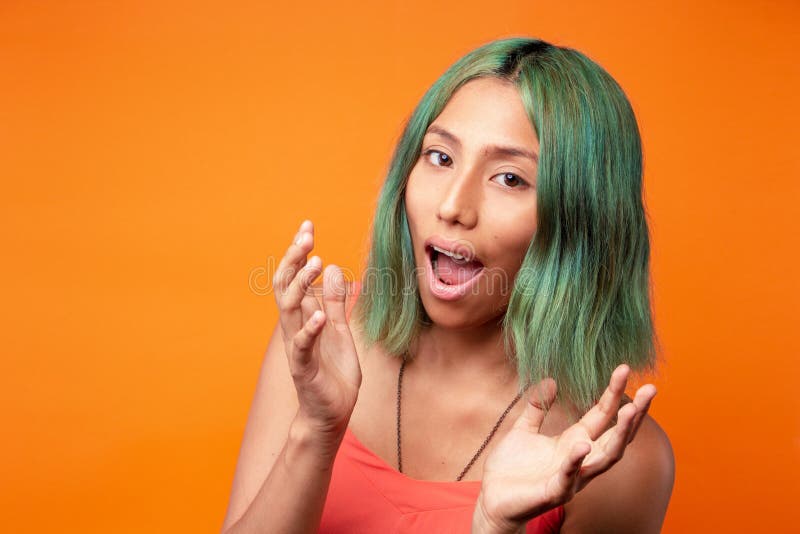 Woman Wearing Orange Spaghetti Strap Top Picture. Image: 117486333