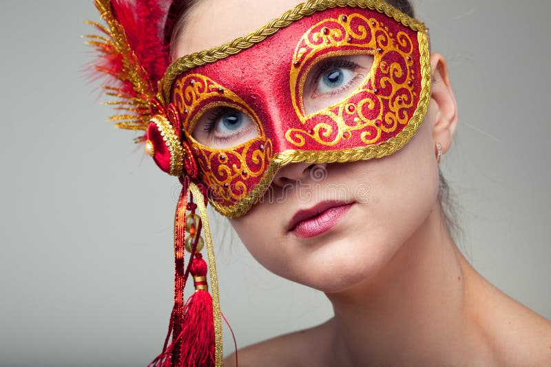 Woman Wearing Red Carnival Mask Stock Image - Image of masked, glowing ...