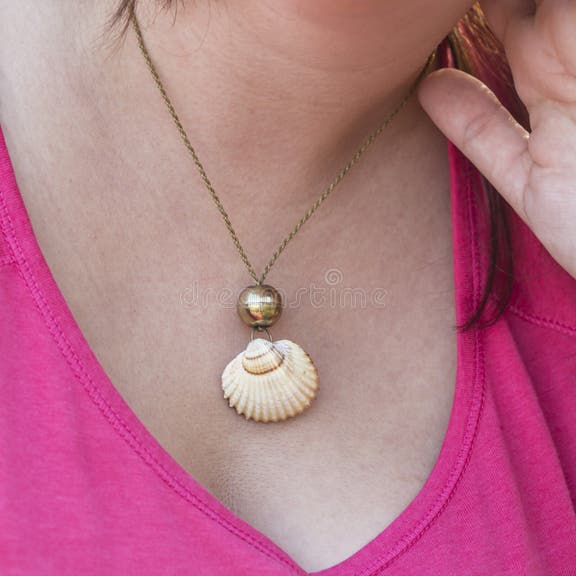Woman Wearing Shell Necklace Stock Image - Image of ocean, jewellery ...