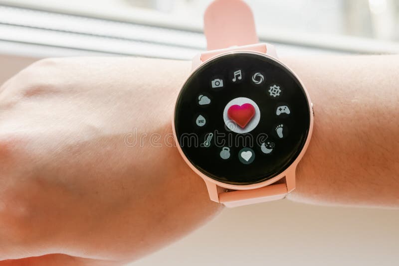 A Woman is Wearing a Smart Wristwatch with Various Functions Stock ...