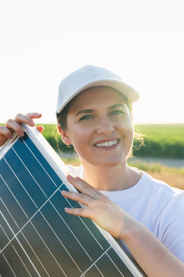 Woman Wearing White Cap and T-shirt Holds Solar Panel Stock Image ...
