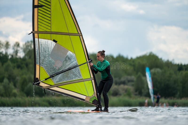 Woman Learning How To Windsurf Stock Image - Image of action, active ...