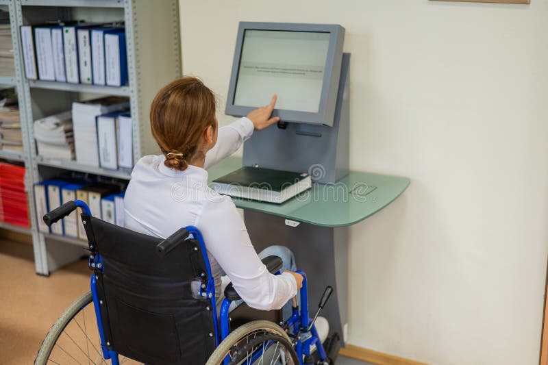 A Woman in a Wheelchair in the Library. Special Electronic Catalog ...