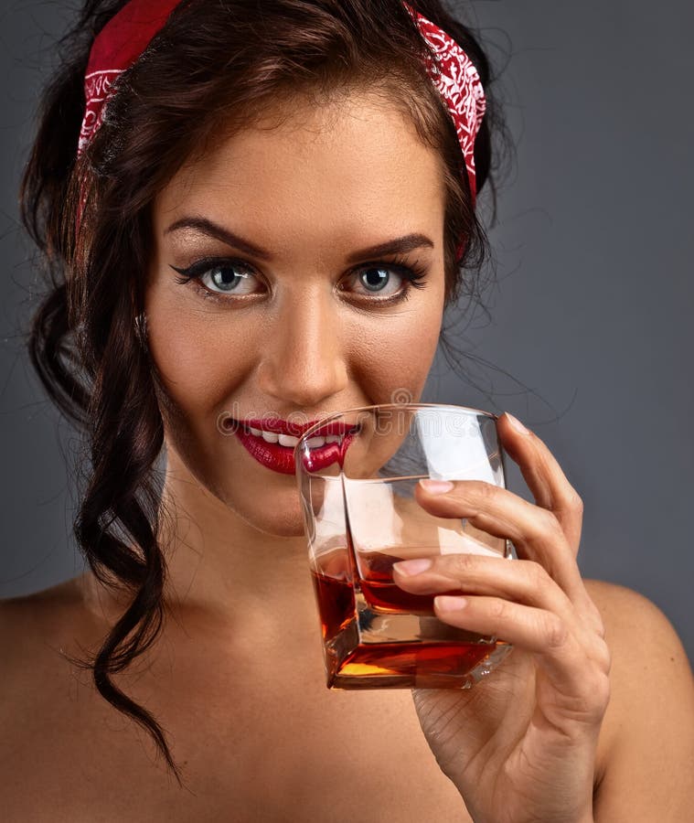 Woman with whiskey stock image. Image of glamour, shot - 64519303