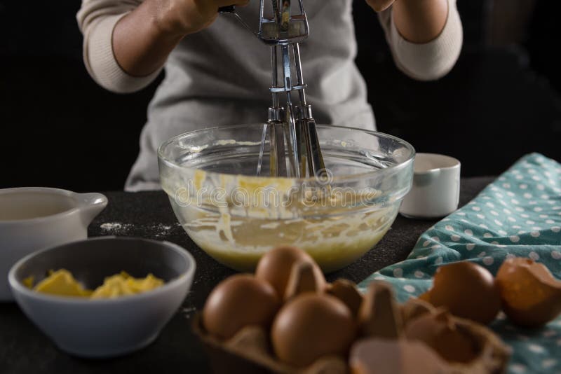 Woman Whisking Batter in a Bowl Stock Image - Image of tray, stay ...