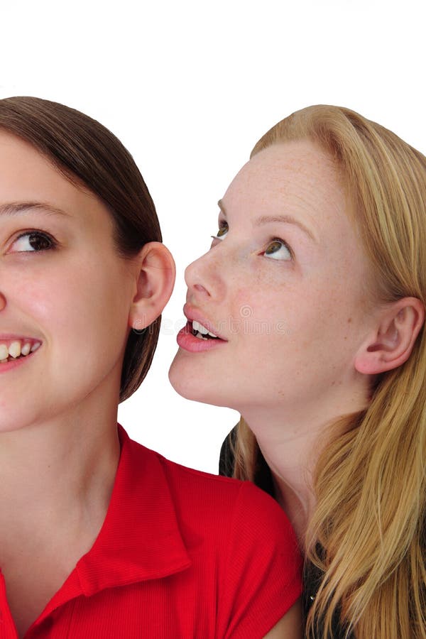 Woman Whispering in FriendÂ´s Ear Stock Image - Image of expression ...