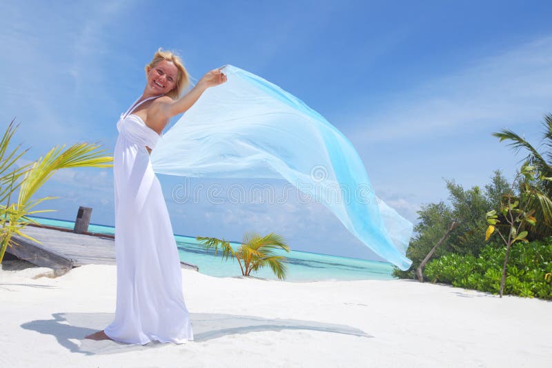 289 Woman Beach Wind Blowing Fabric Stock Photos - Free & Royalty-Free ...